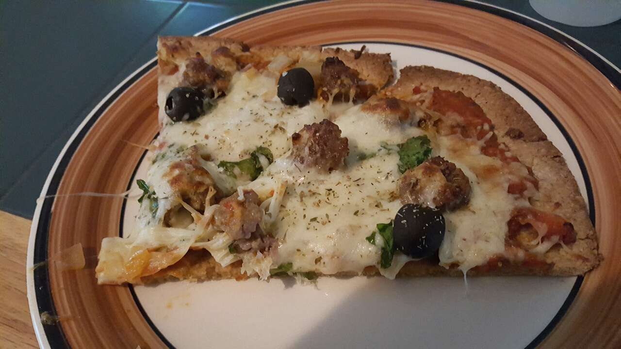 Made this yummy oat flour pizza crust tonight. It was a first for us ...