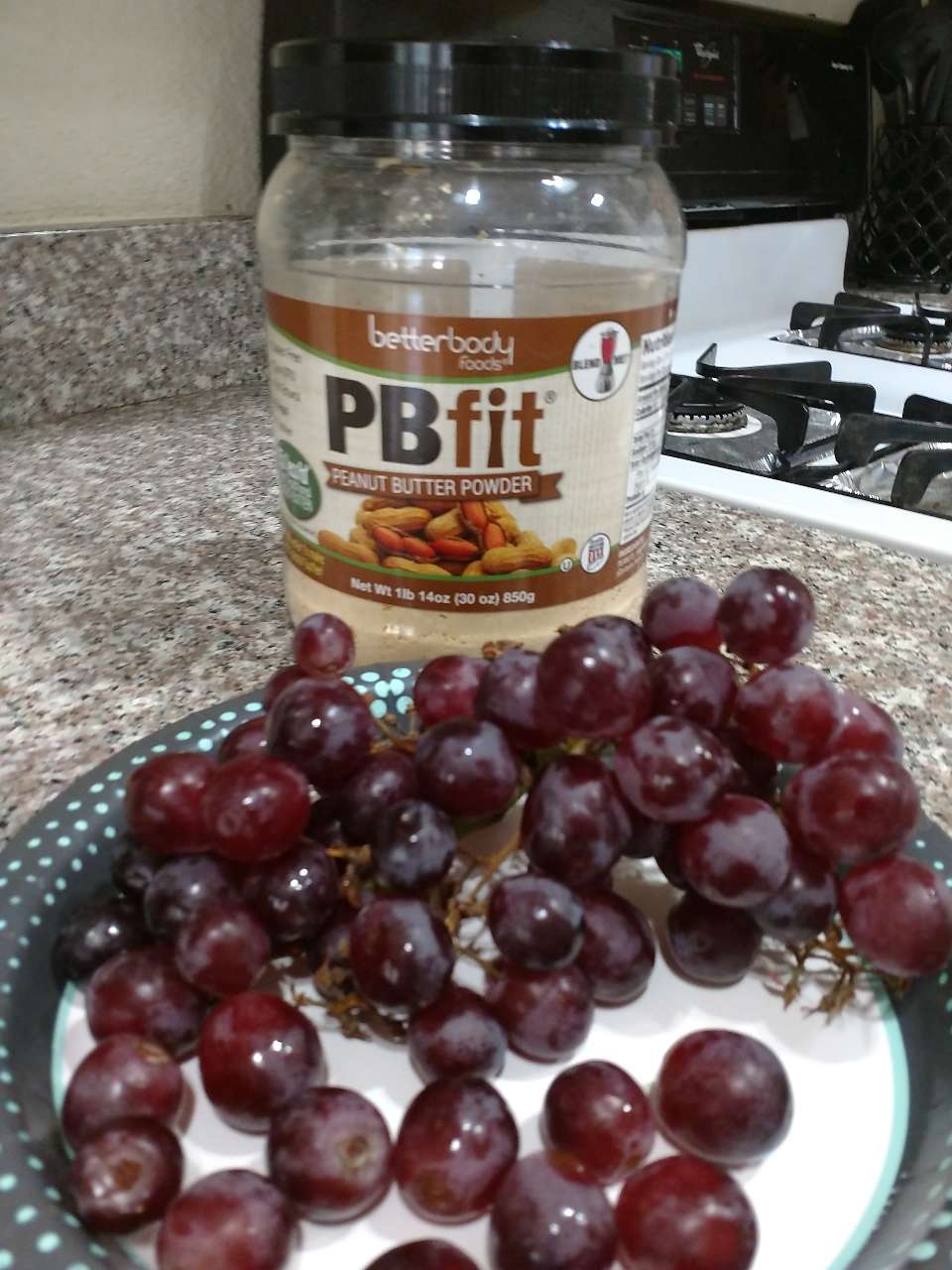 Mix PB powder with water to a good consistency to roll and coat grapes ...