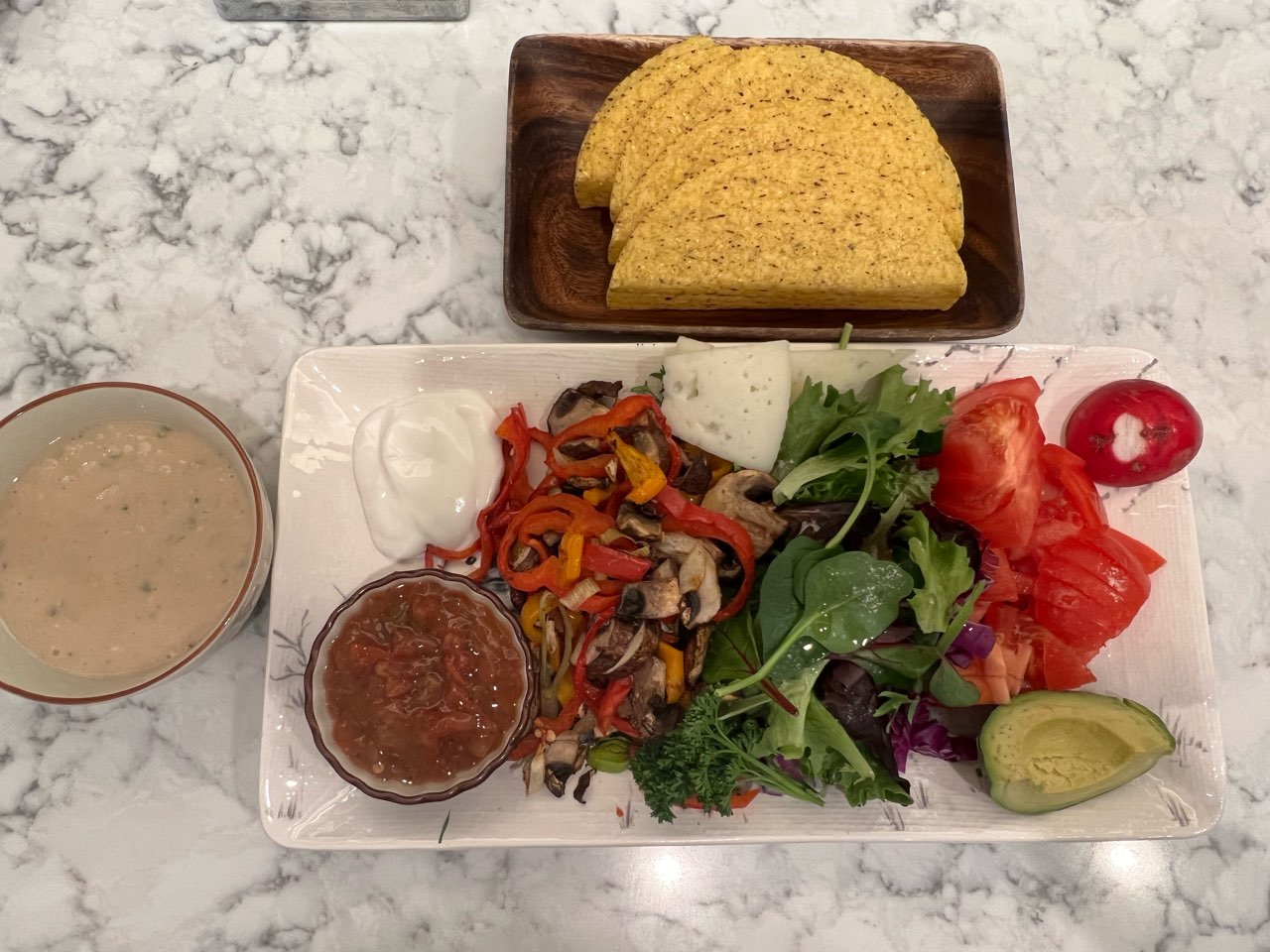 How we taco! Almost vegan less the slice of cheese. I messed up the ...