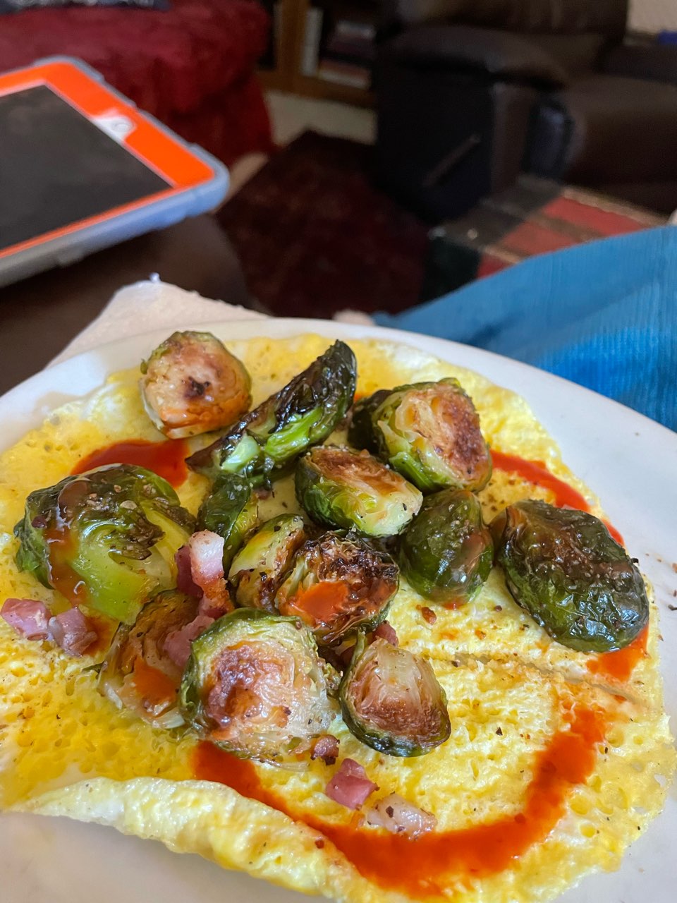 2 egg open face omelette topped with 1C brussle sprouts w/pancetta and ...