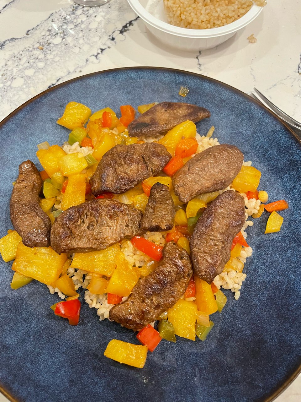 1/2 cup Brown rice base, 1 cup cooked multi-color peppers and onions ...